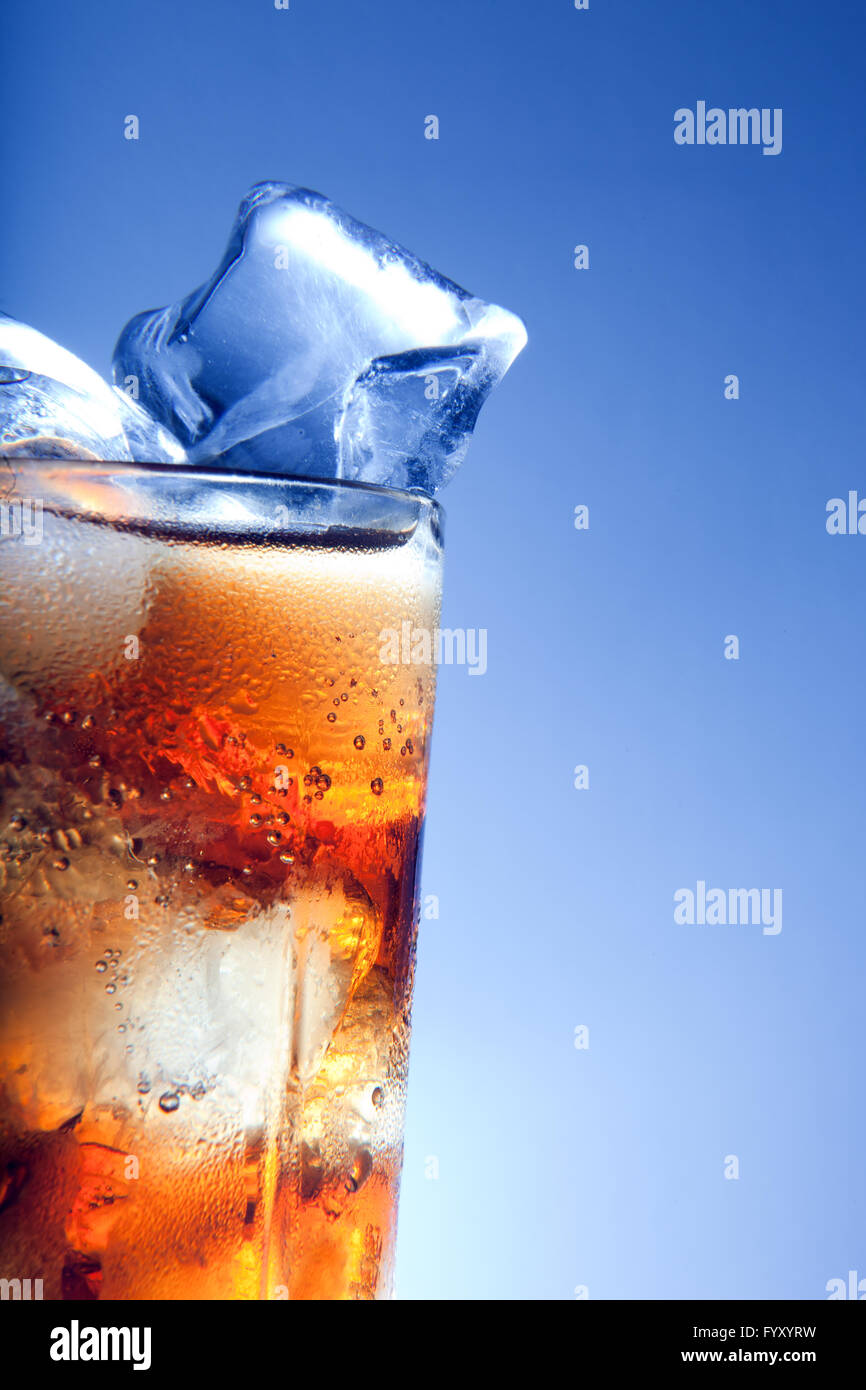 A fresh glass of cola with ice Stock Photo - Alamy