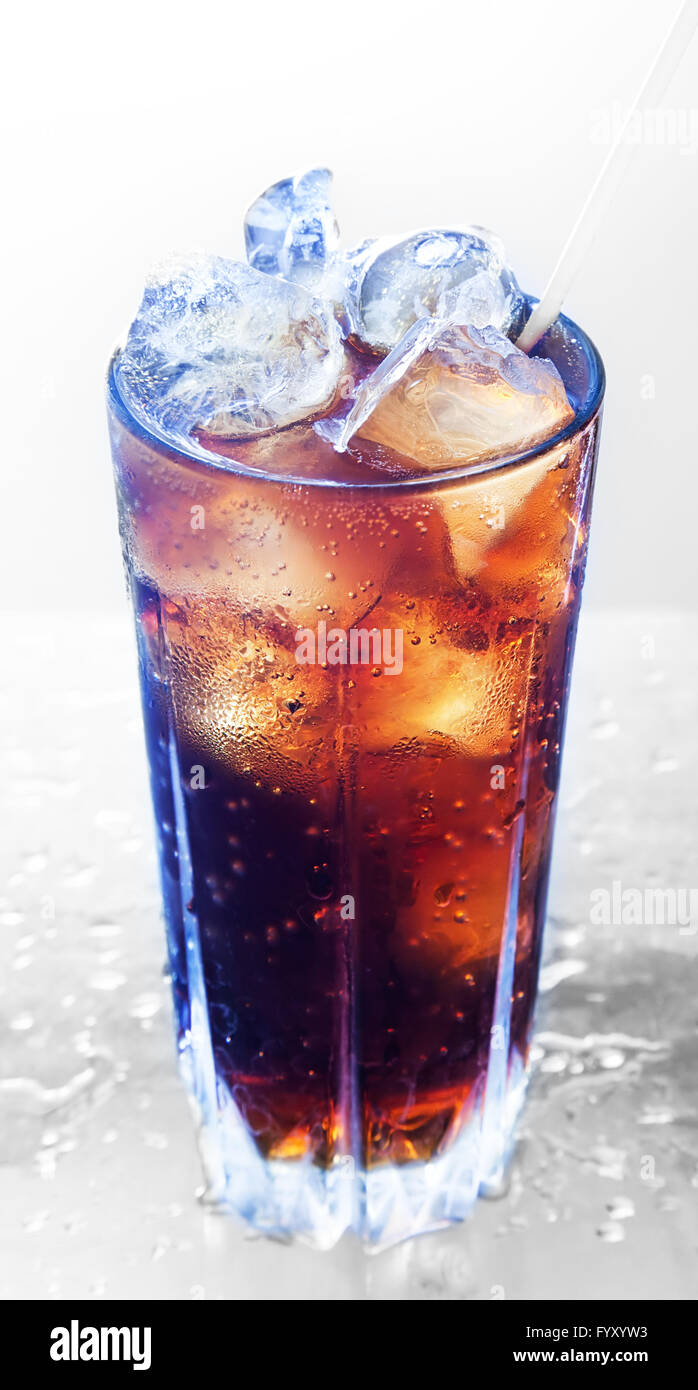A fresh glass of cola with ice Stock Photo - Alamy