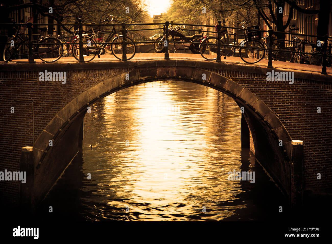 Amsterdam. Romantic bridge over canal Stock Photo - Alamy