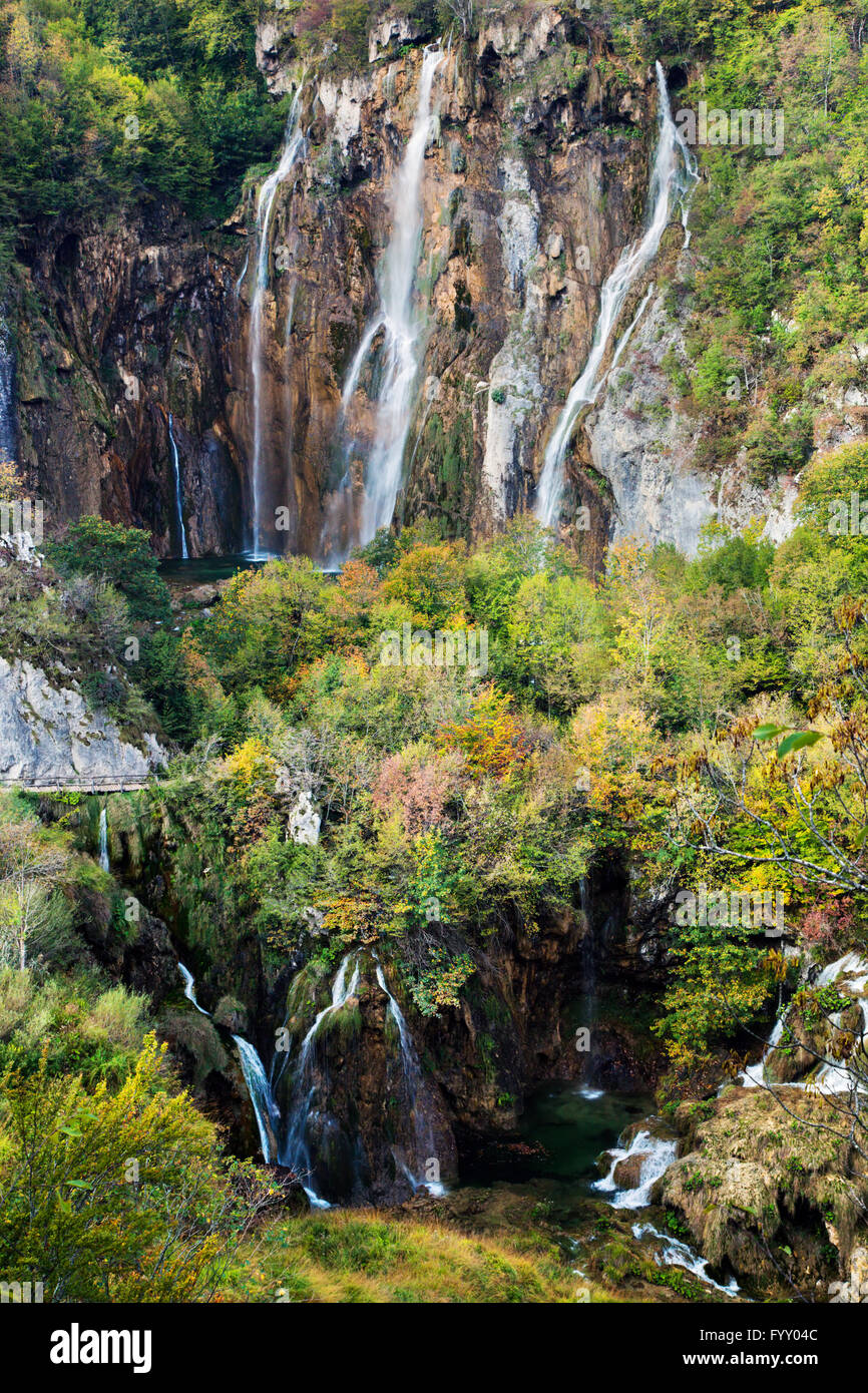 Waterfall in forest. Crystal clear water Stock Photo - Alamy
