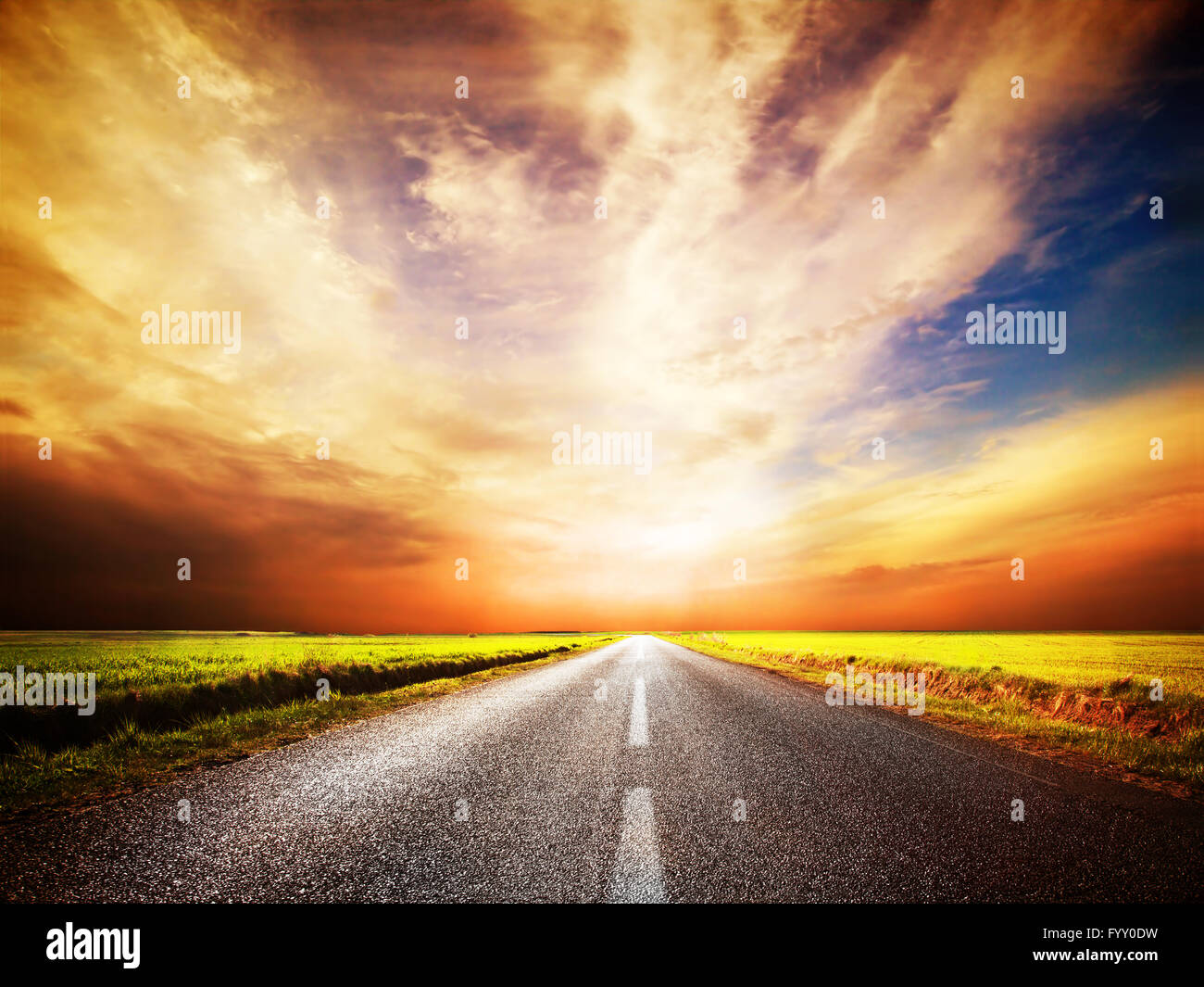 Empty asphalt road. Sunset Sky Stock Photo - Alamy