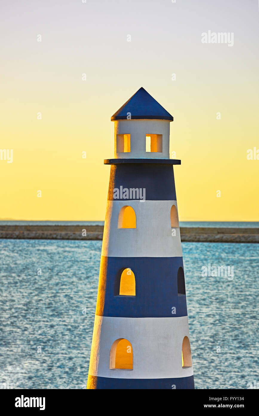 Lighthouse monument at the harbor. Denia. Alicante. Valencia Community ...