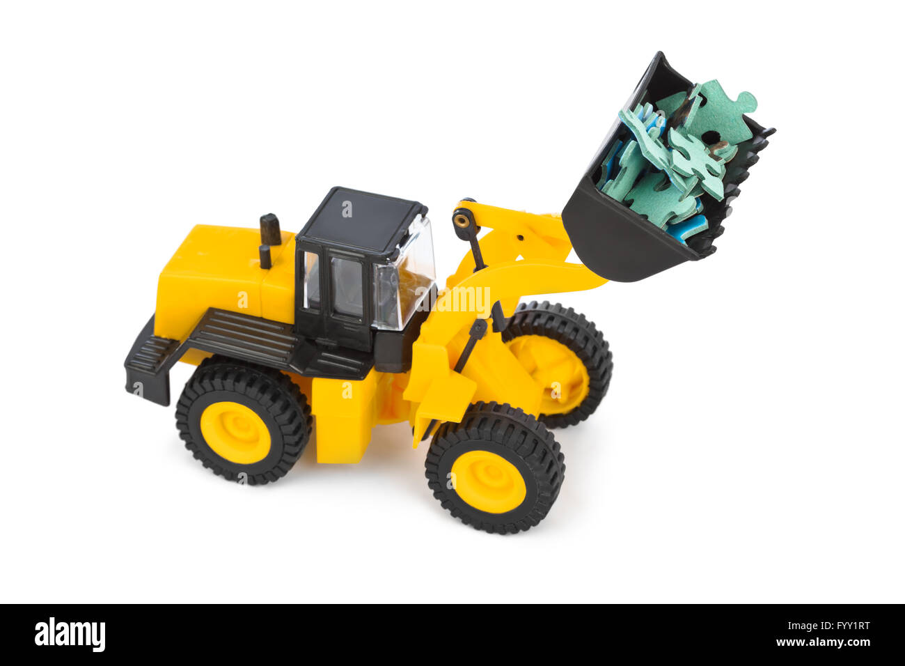 Toy loader and puzzle Stock Photo - Alamy