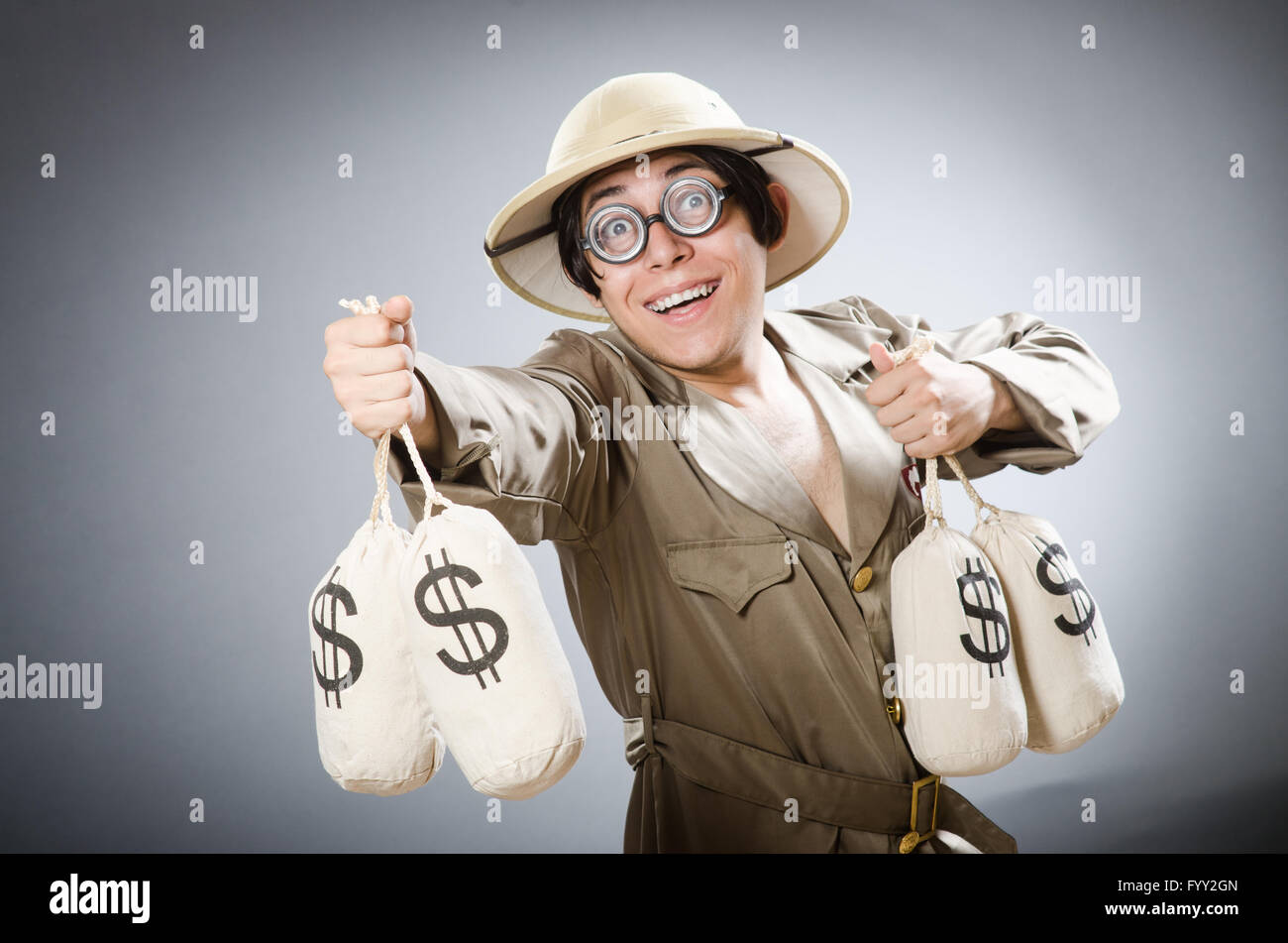 Funny safari traveller in travelling concept Stock Photo - Alamy