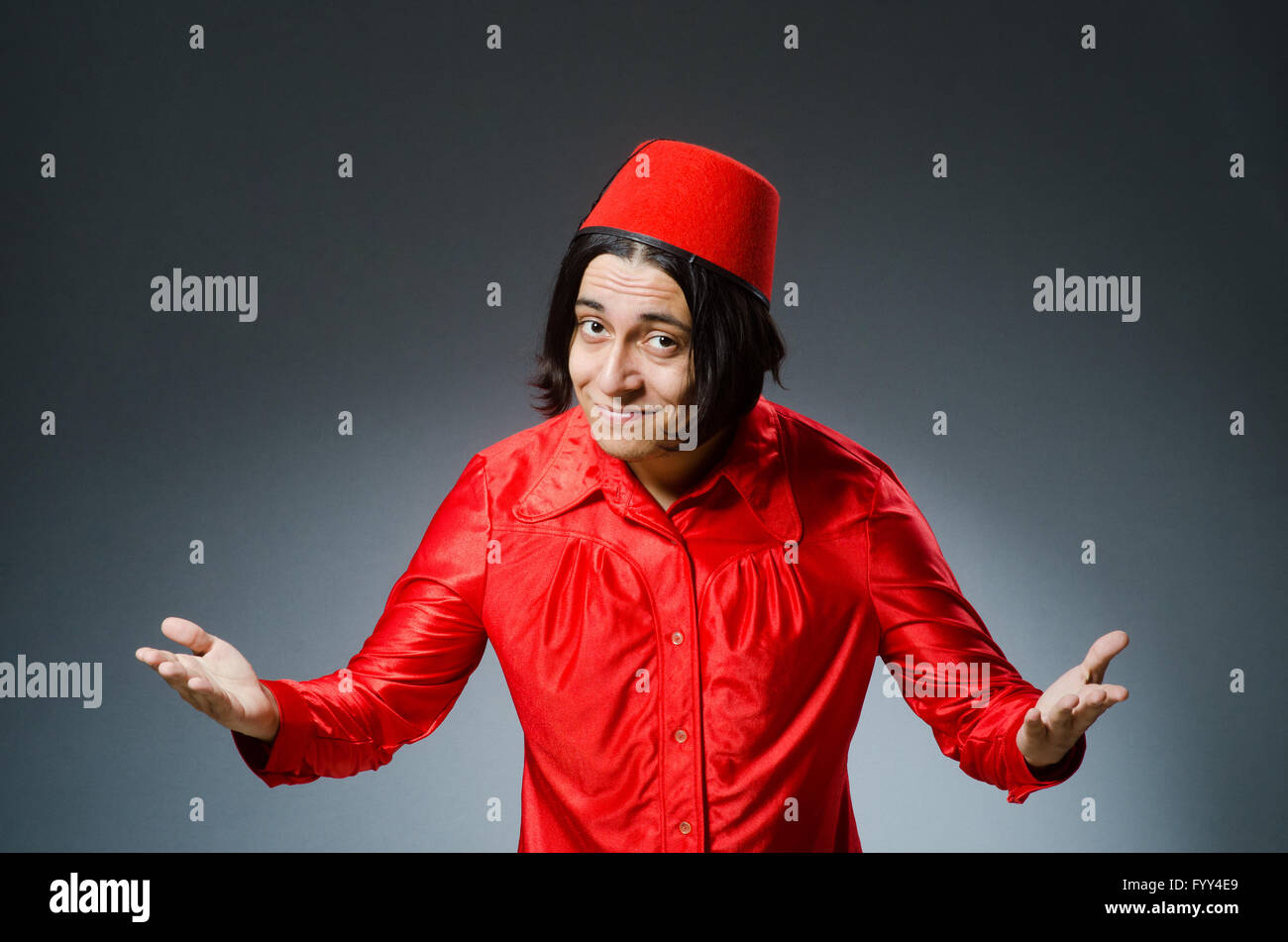 Man wearing red fez hat Stock Photo - Alamy