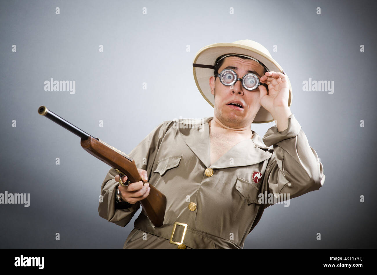 Funny hunter in hunting concept Stock Photo - Alamy