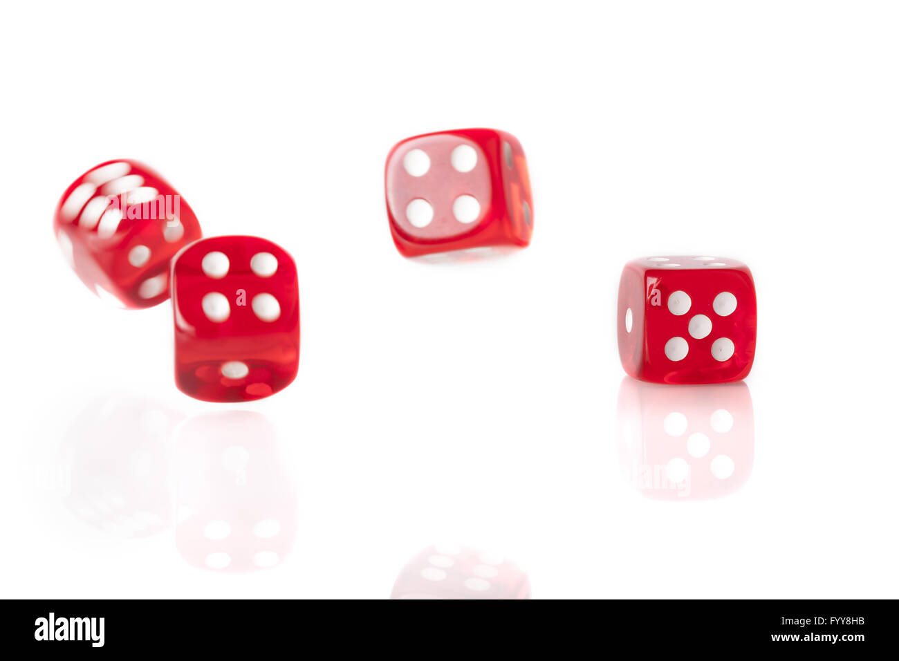 Four Red Dice Stock Photo - Alamy