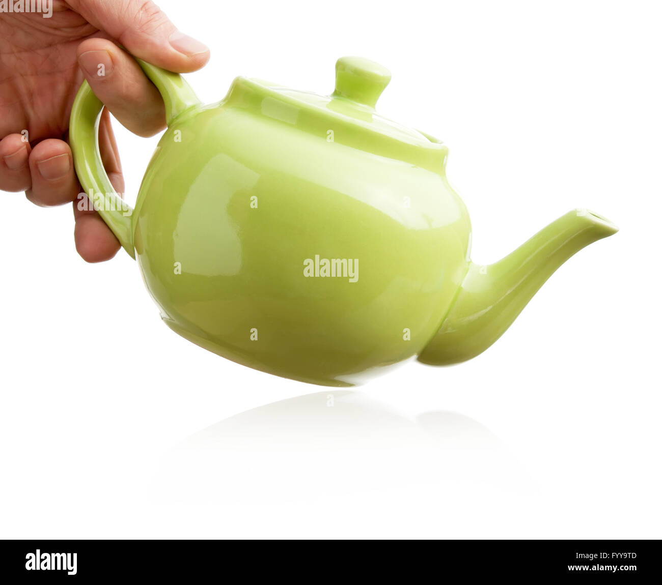 teapot in hand Stock Photo - Alamy