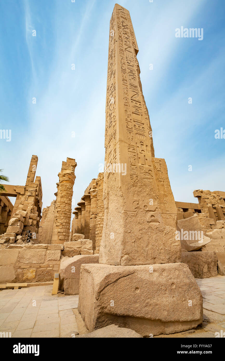 Obelisk and row of pillars inside the Temple of Karnak. Luxor, Egypt ...