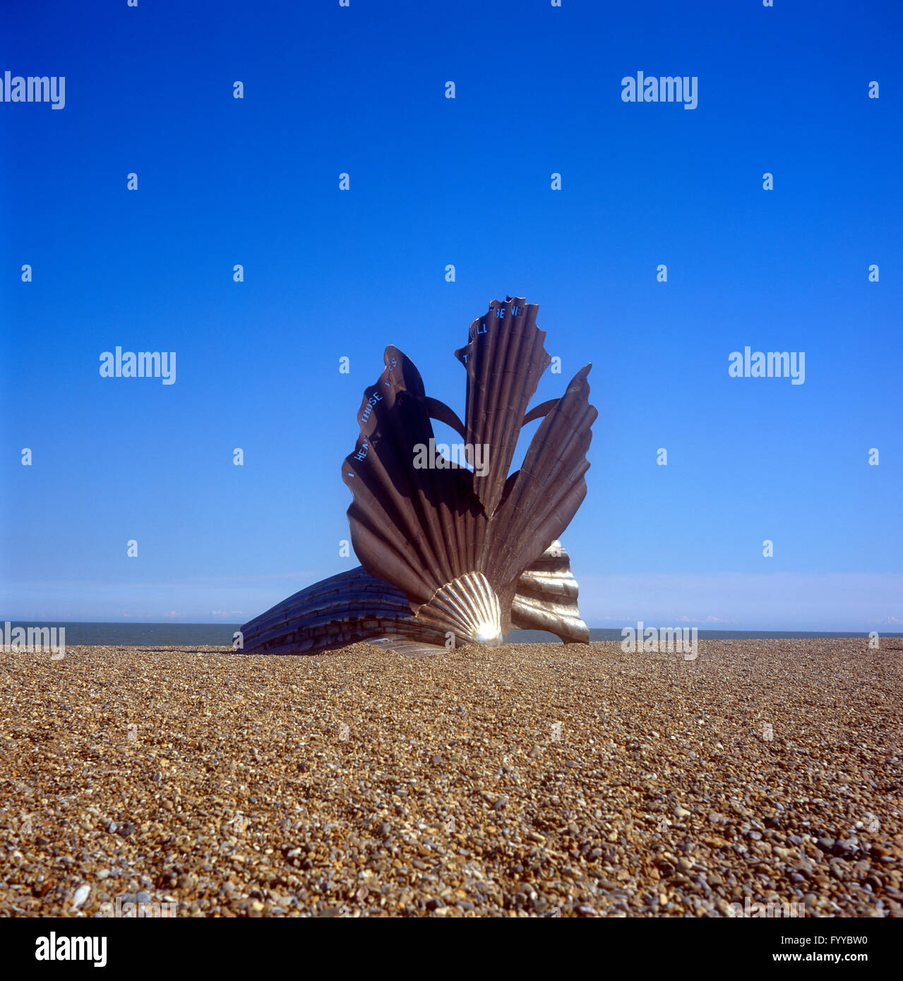 Shell statue on a pebbled beach, outside Stock Photo - Alamy