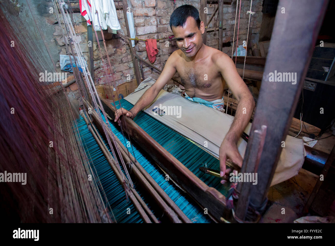 Man weaving saree hi-res stock photography and images - Alamy