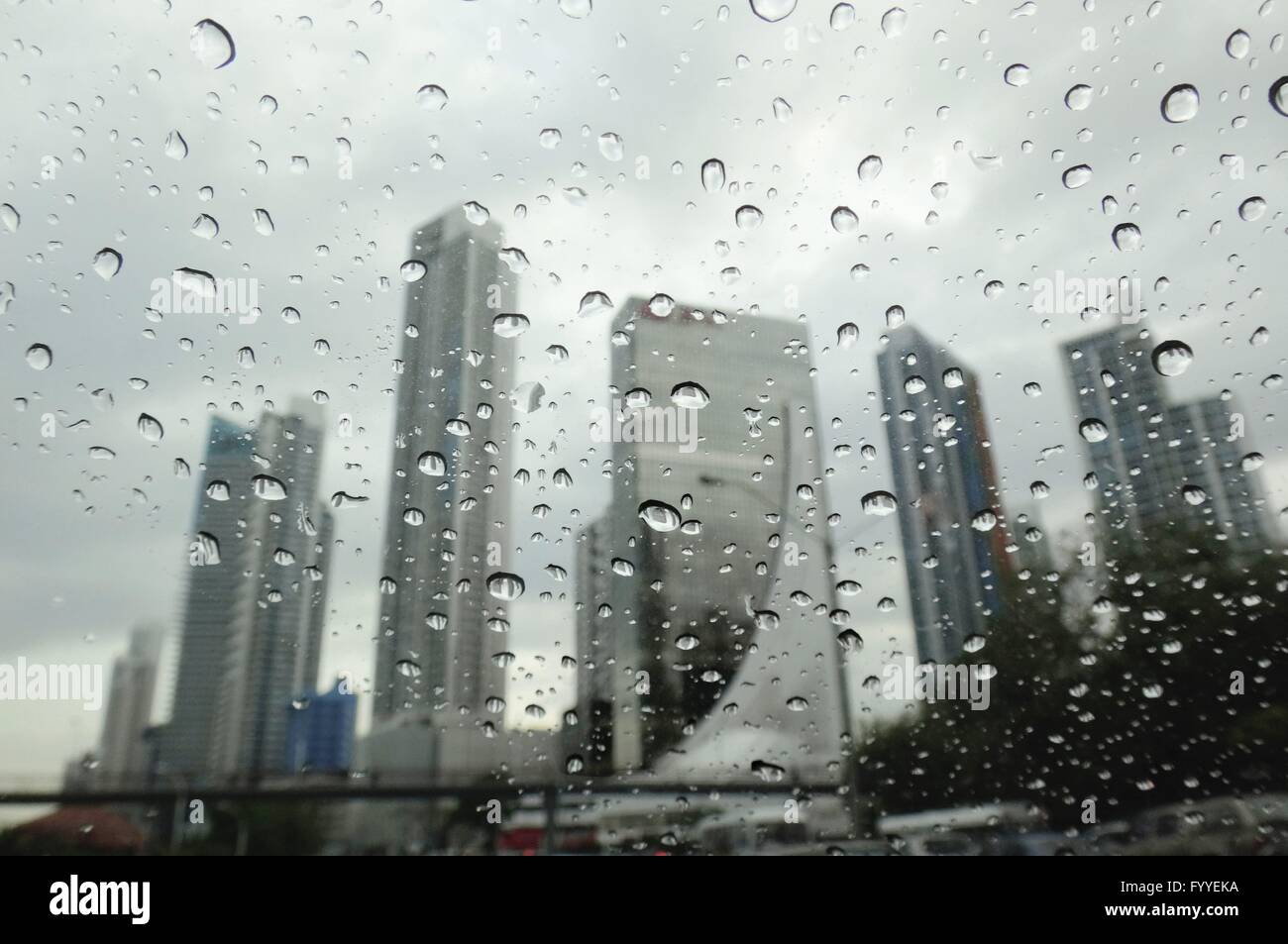 Gray skyline with skyscrapers of Panama City behind raindrops - 14 May ...