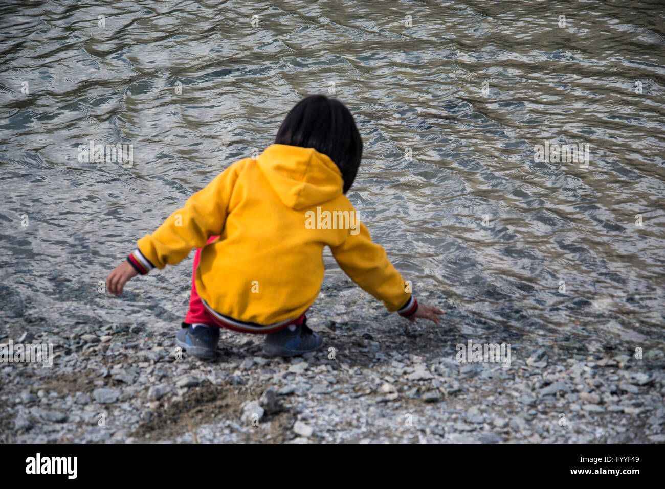 Playing side by side hi-res stock photography and images - Alamy