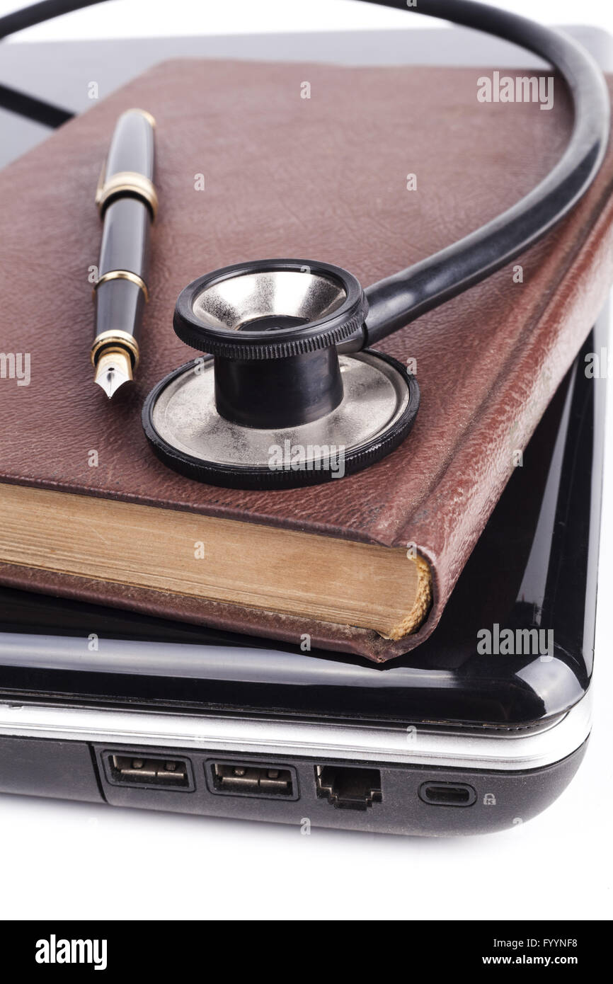 Old book on black laptop hi-res stock photography and images - Alamy