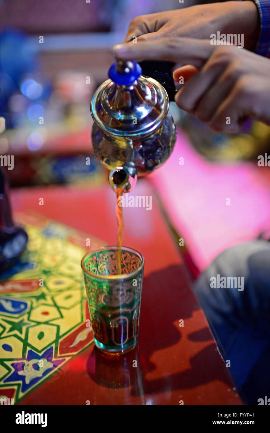 Woman serving tea at tea house, Granada, Spain Stock Photo - Alamy