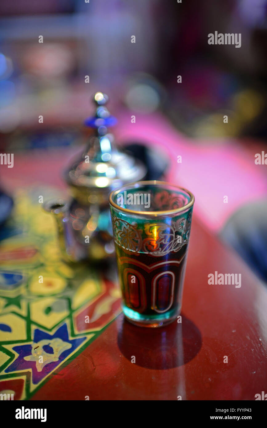 Tea glass and jar on table at tea house, Granada, Spain Stock Photo - Alamy