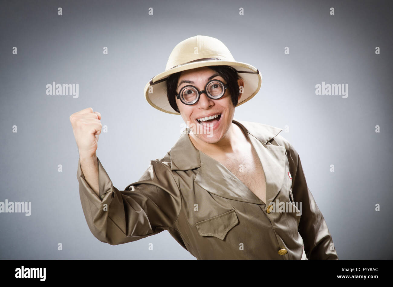 Funny safari traveller in travelling concept Stock Photo - Alamy