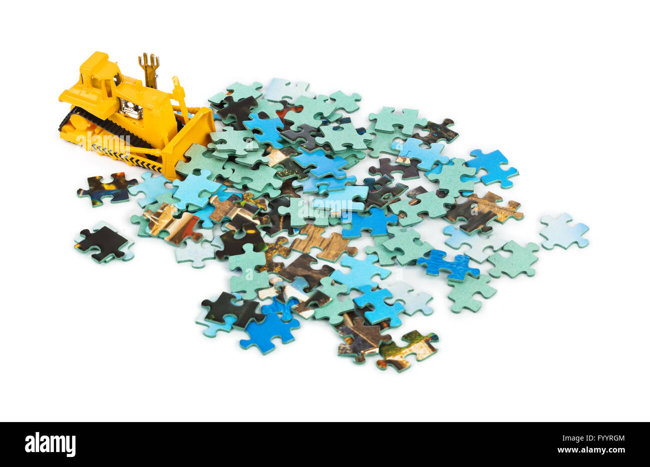 Toy bulldozer and puzzle Stock Photo - Alamy
