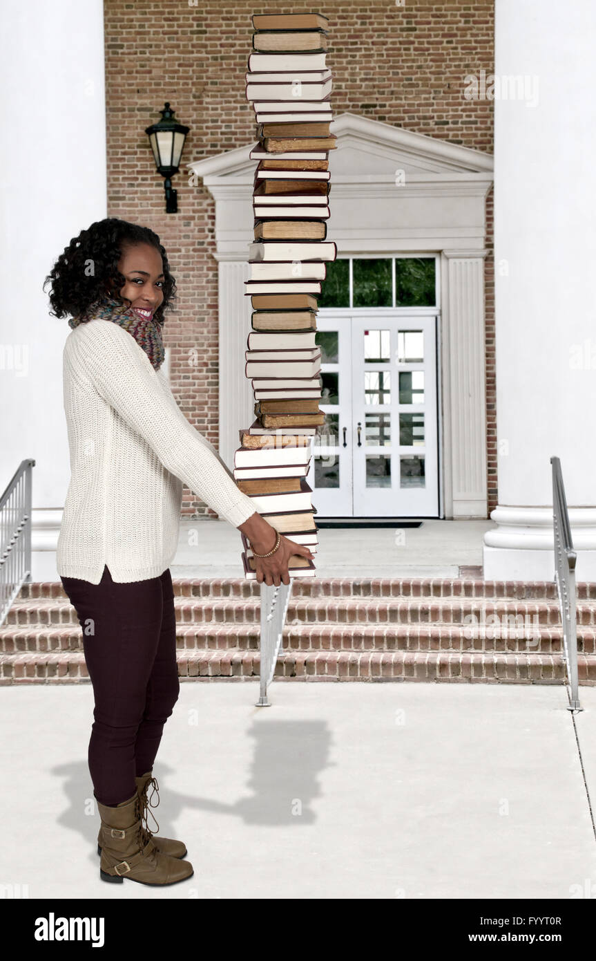 Girl carrying school books hi-res stock photography and images - Alamy