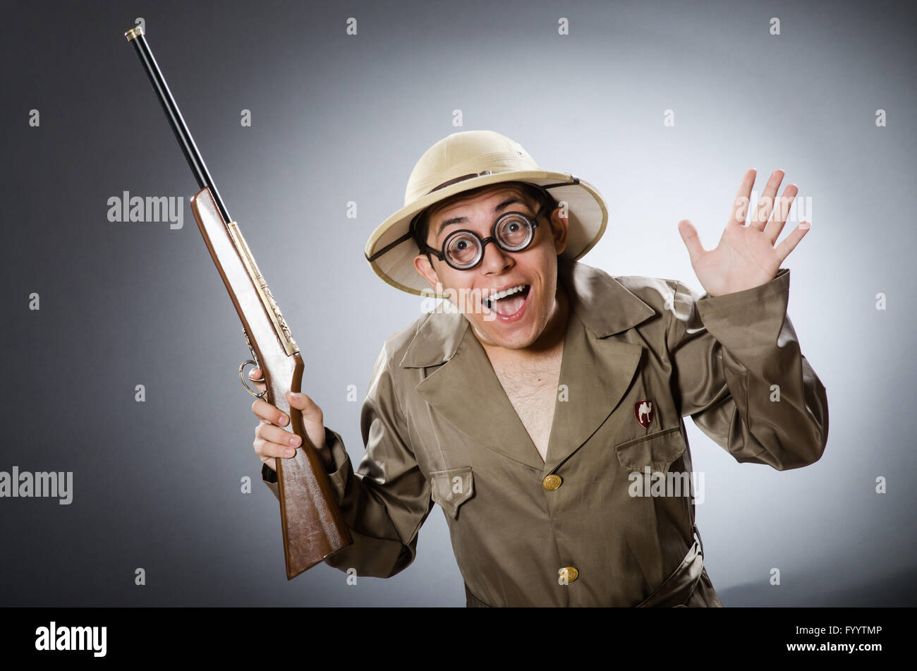 Funny hunter in hunting concept Stock Photo - Alamy
