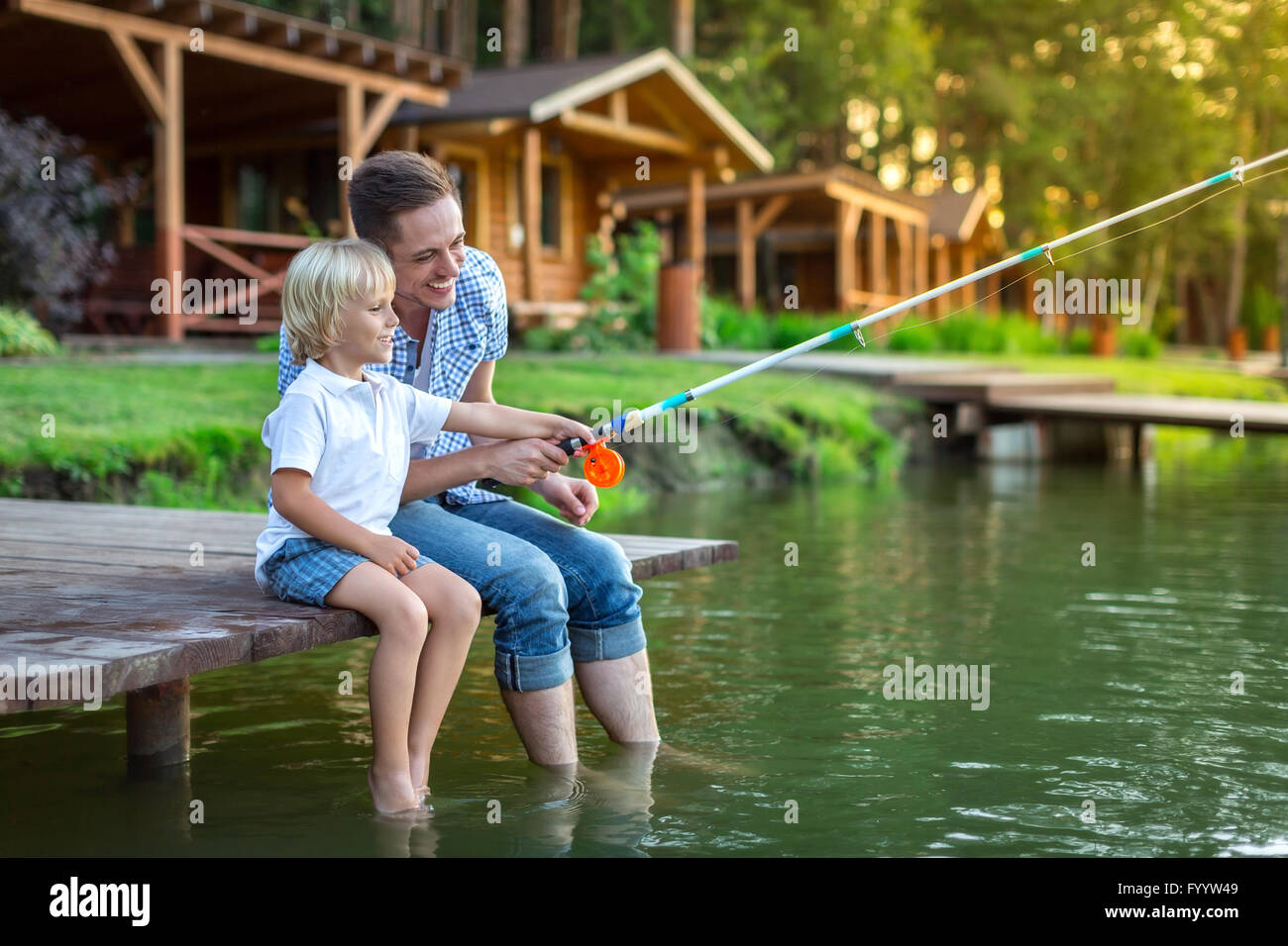 Teaching fishing hi-res stock photography and images - Alamy