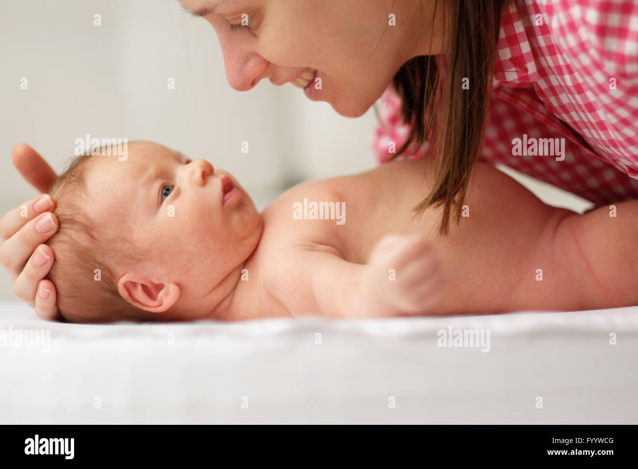 One month old newborn baby with mother Stock Photo - Alamy