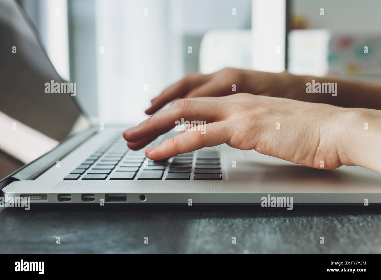 woman's hands working on laptop computer Stock Photo - Alamy