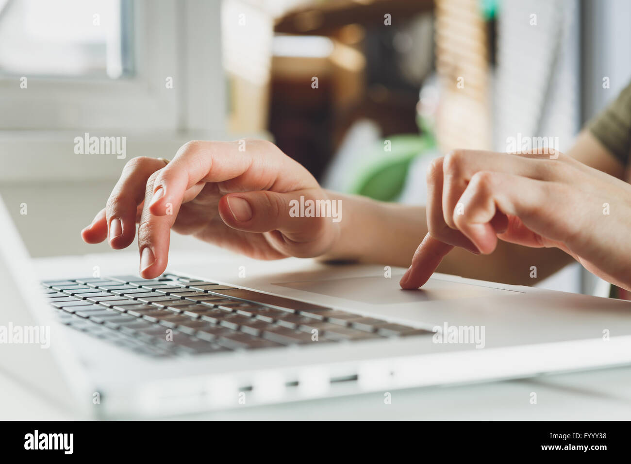 woman's hands working on laptop computer Stock Photo - Alamy