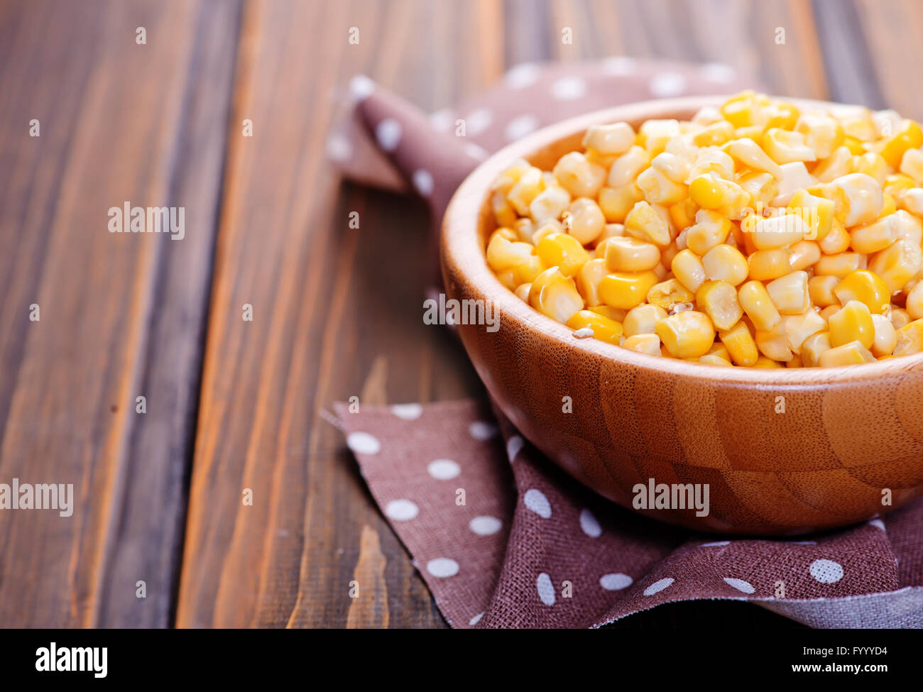 yellow corn in bamboo bowls and on a table Stock Photo - Alamy