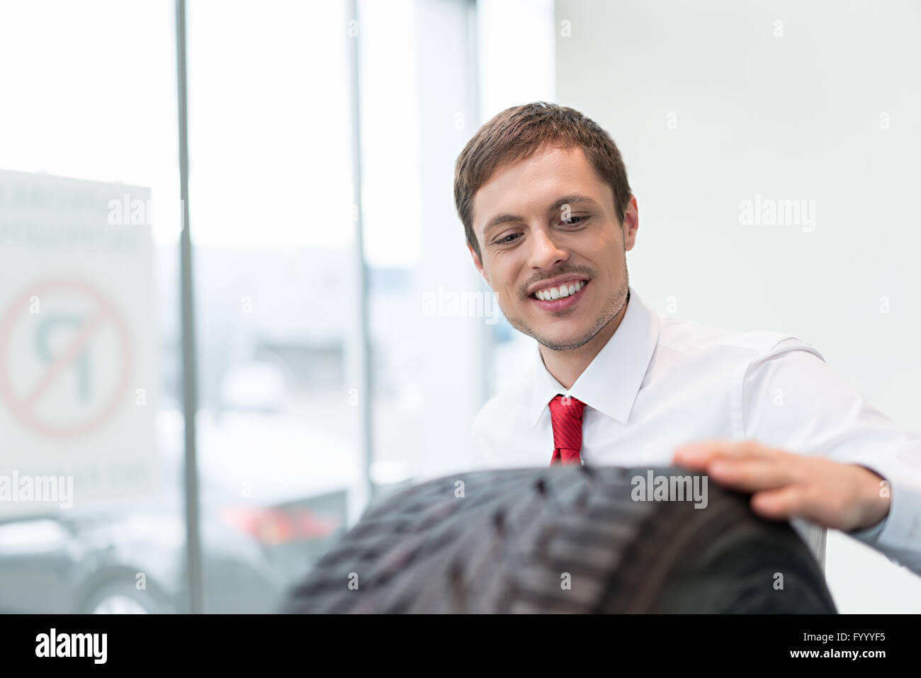 Professional car dealership worker hi-res stock photography and images ...