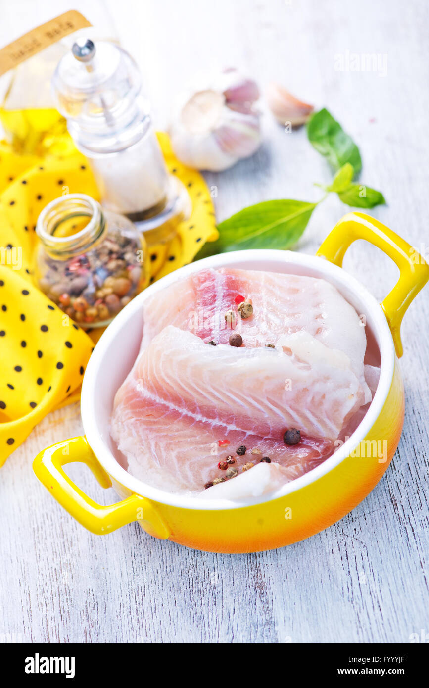 raw fish with spice and salt in the bowl Stock Photo - Alamy