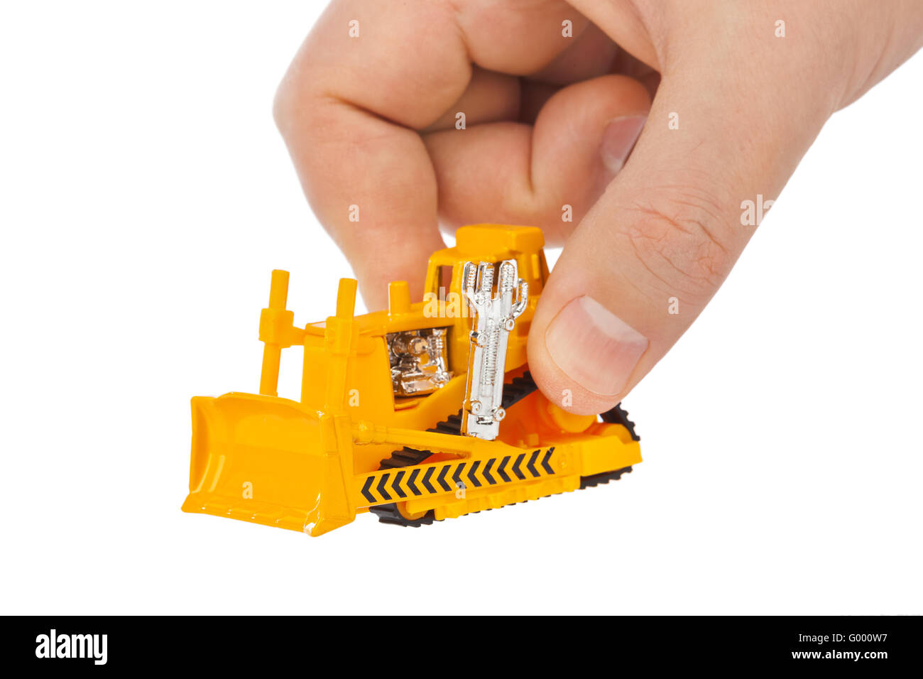 Hand with toy bulldozer Stock Photo - Alamy