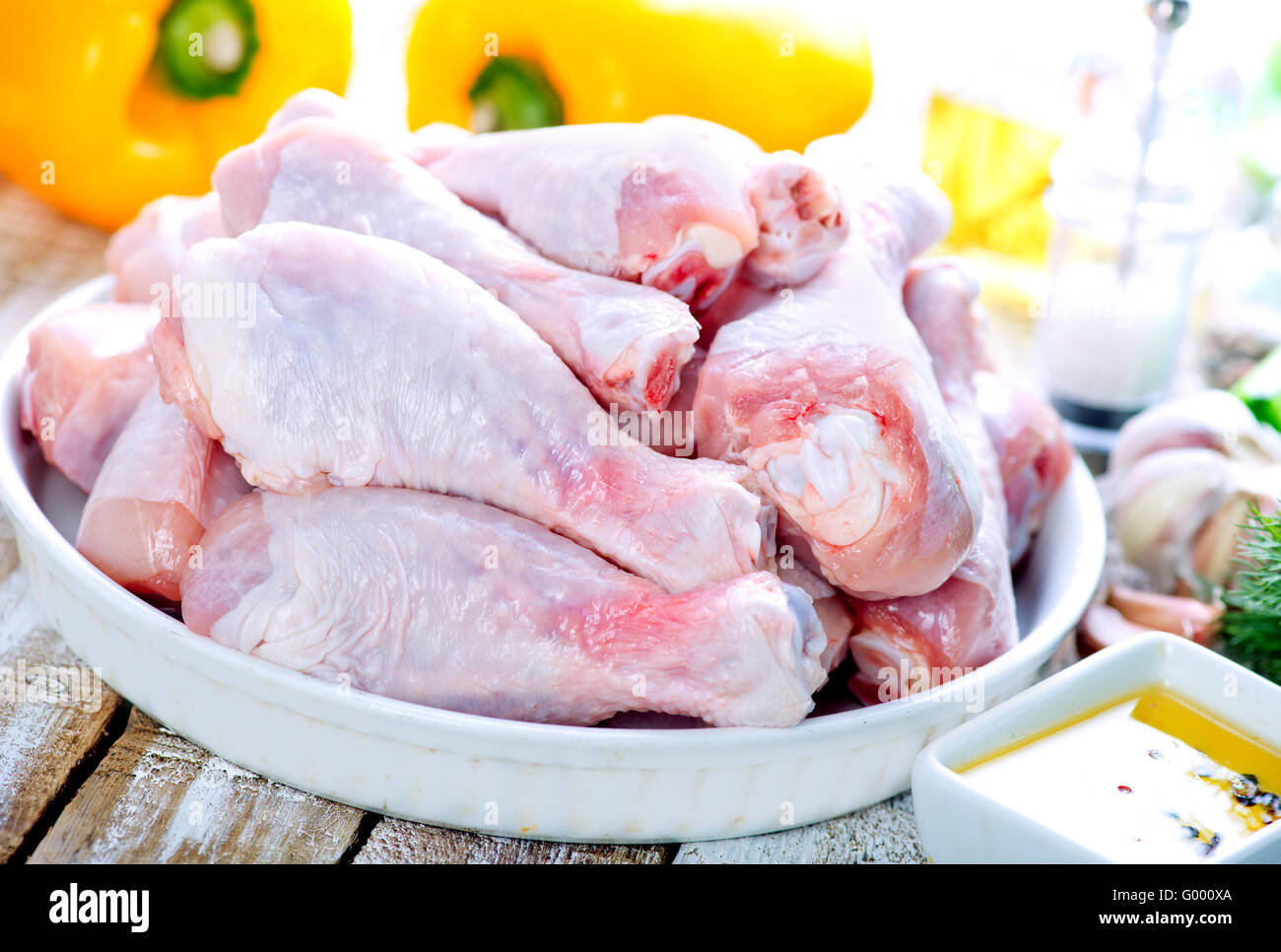 raw chicken legs with salt and spice Stock Photo - Alamy