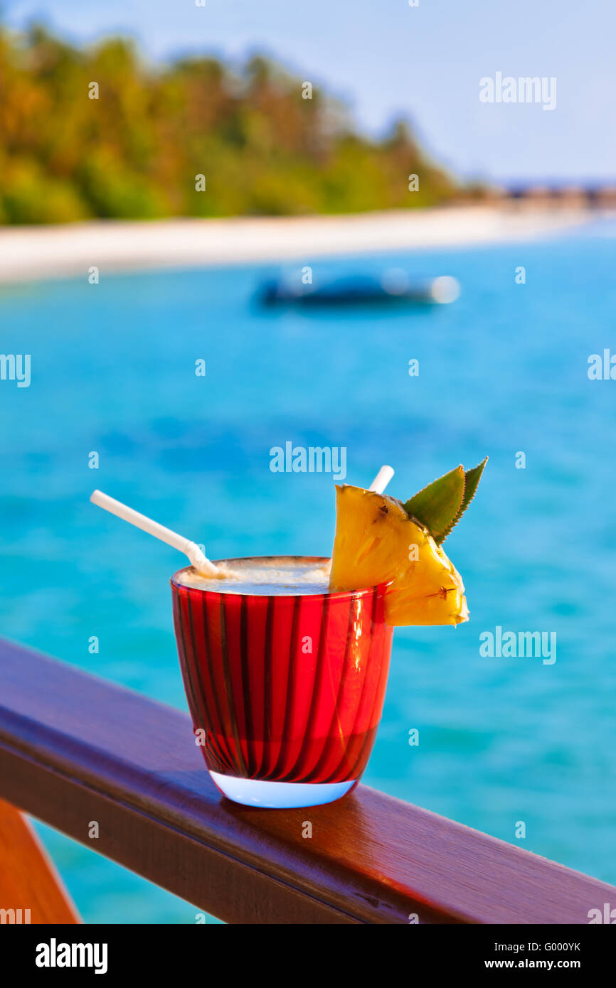 Fruit cocktail on Maldives beach Stock Photo - Alamy