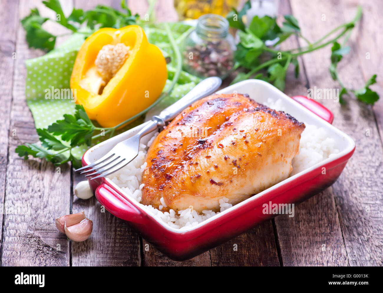 chicken fillet on plate and on a table Stock Photo - Alamy