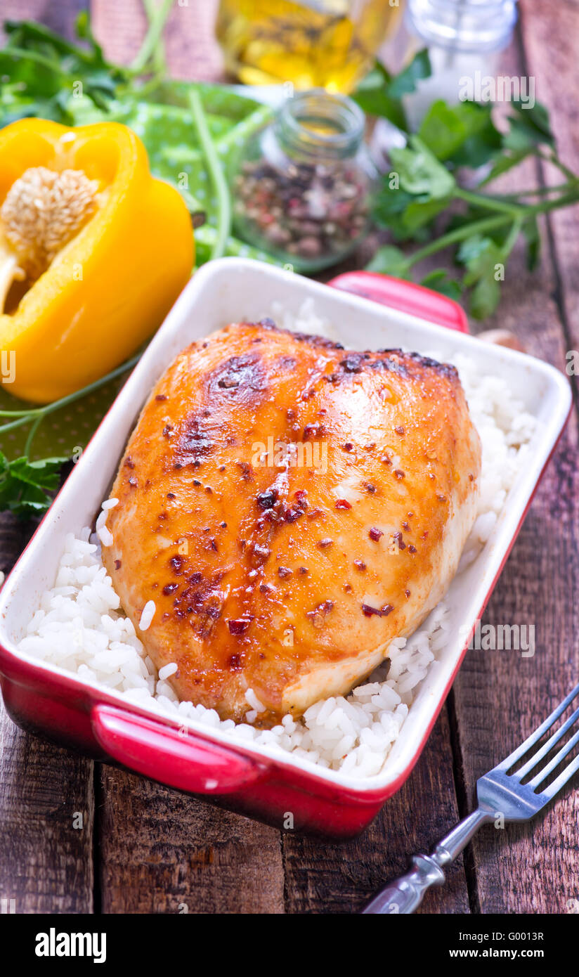 chicken fillet on plate and on a table Stock Photo - Alamy