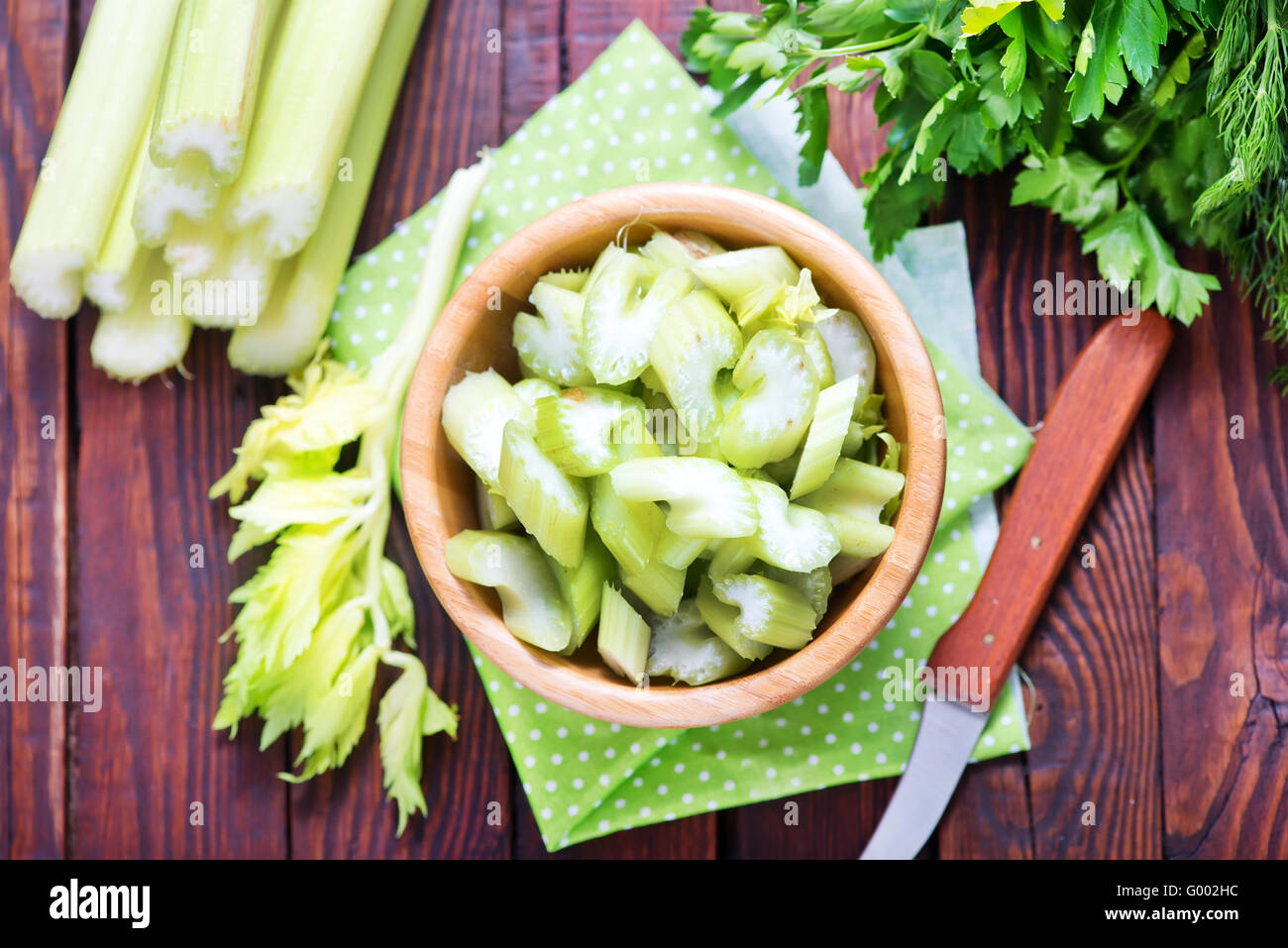 celery in bamboo bowl and on a table Stock Photo - Alamy