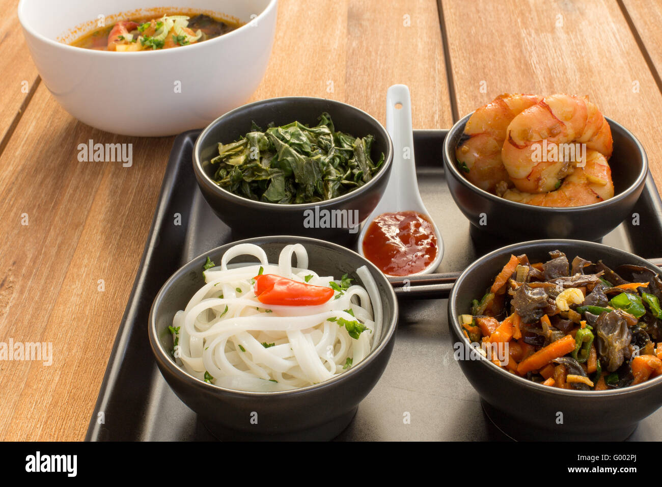 Asian dish with soup Stock Photo - Alamy