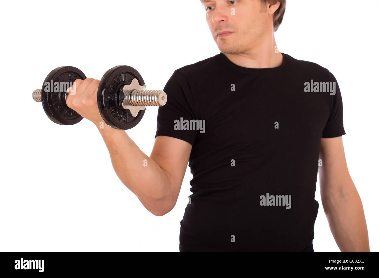 Man doing exercise with a steel dumbbell Stock Photo - Alamy