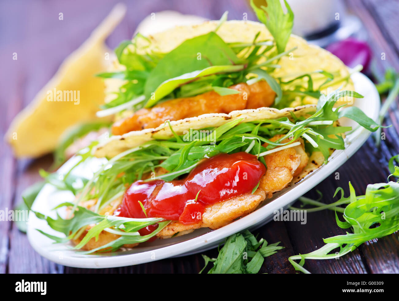 taco with chicken and vegetables on a table Stock Photo - Alamy