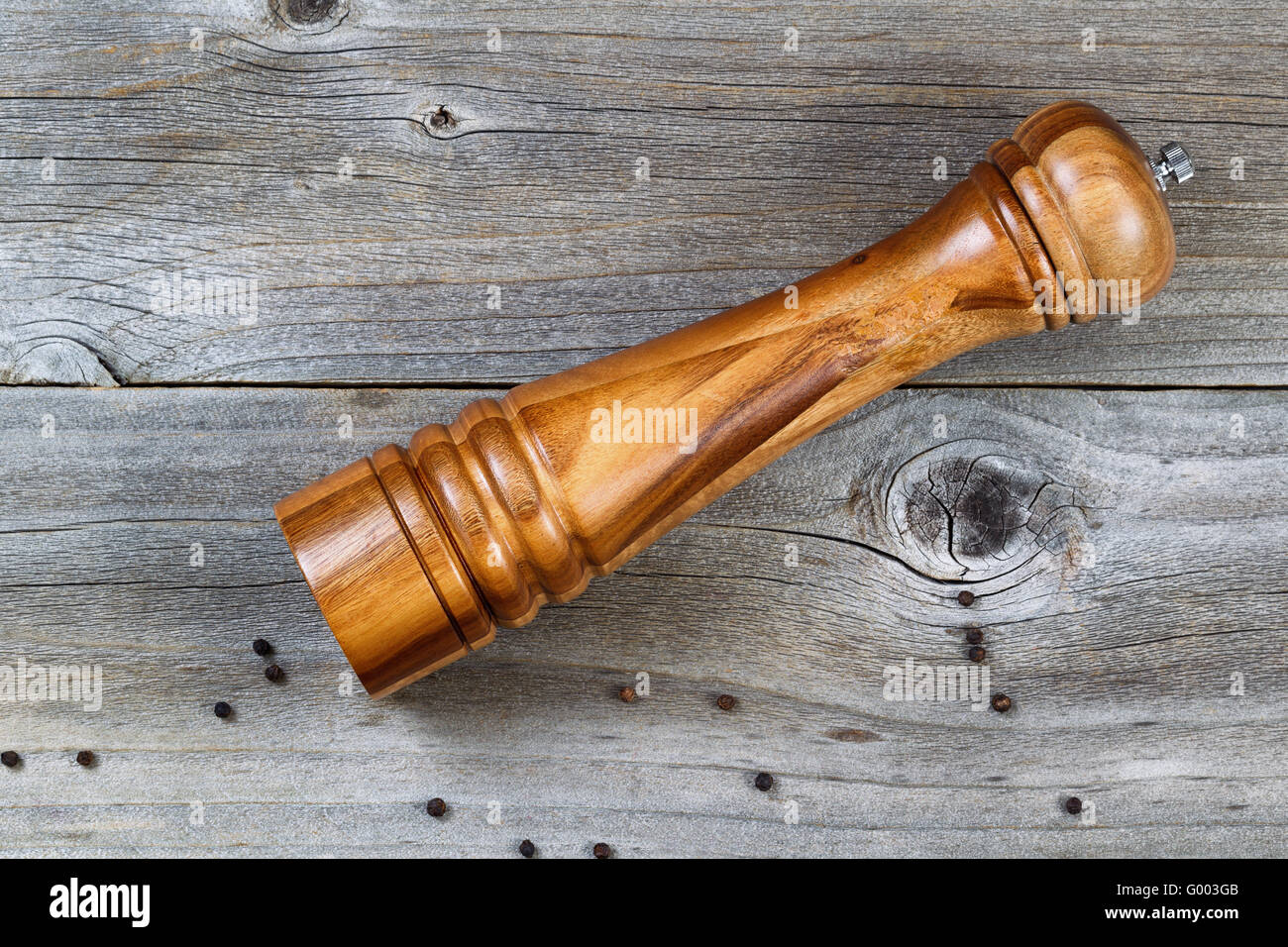 Traditional wooden pepper mill Stock Photo - Alamy