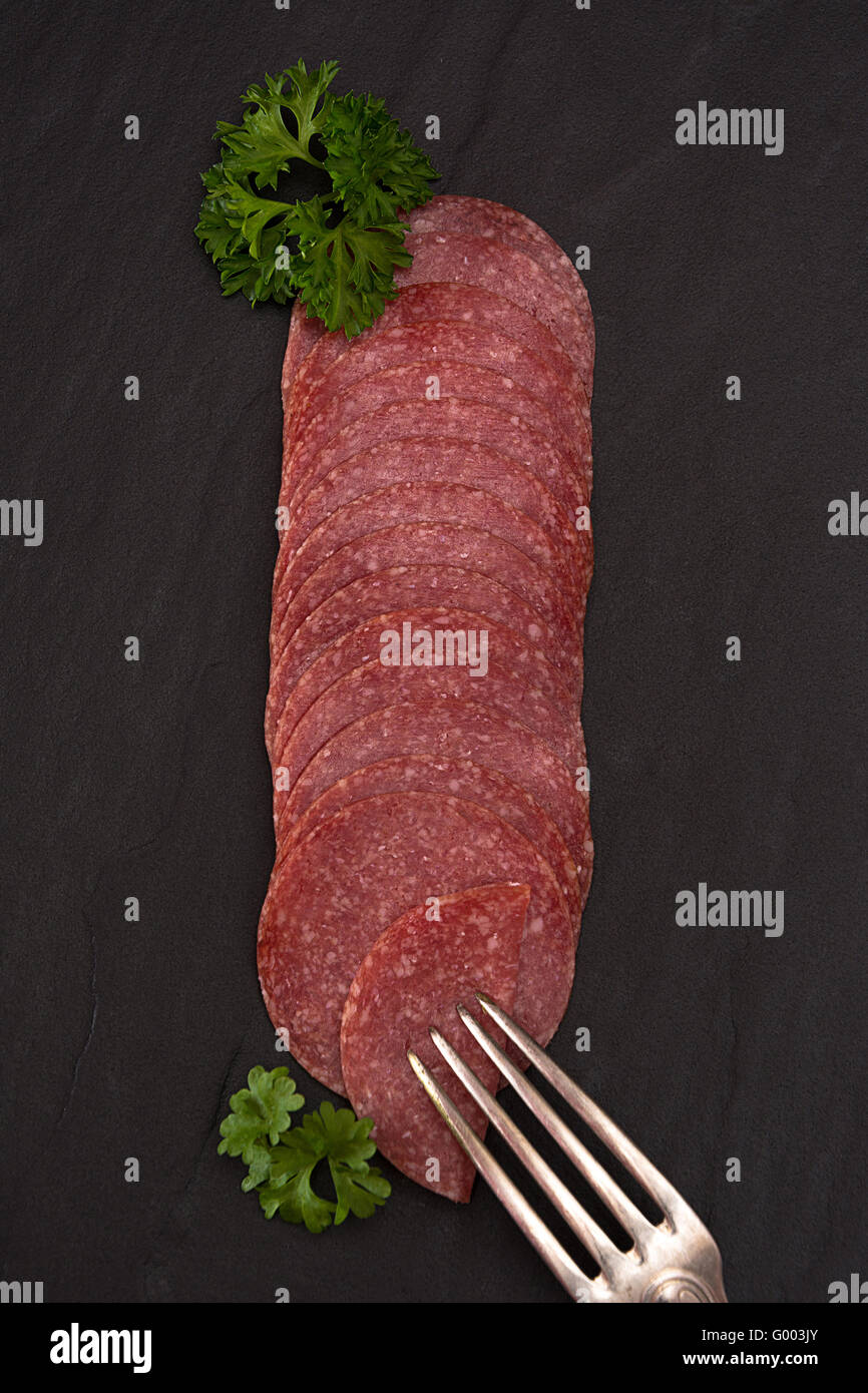 Cut salami hi-res stock photography and images - Alamy