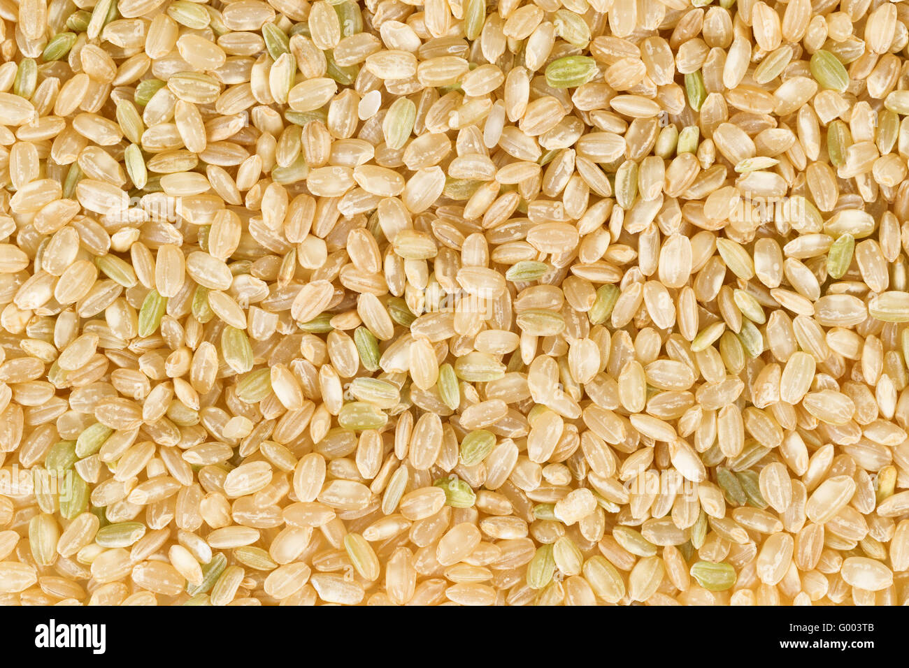 Uncooked organic brown rice Stock Photo - Alamy