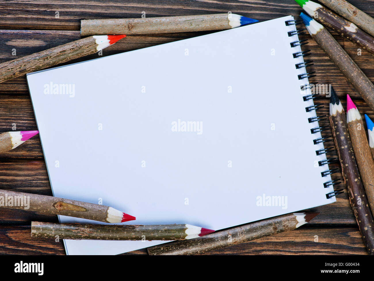 color pencils on the wooden table, pencils on a table Stock Photo - Alamy