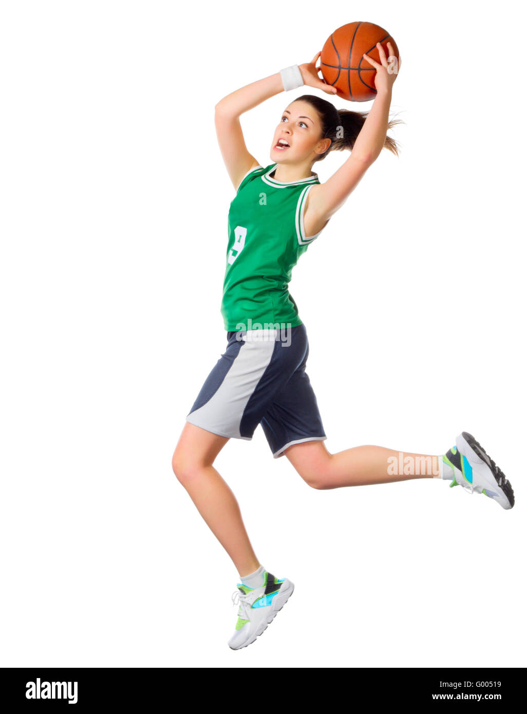 Teenage woman playing basketball hi-res stock photography and images ...