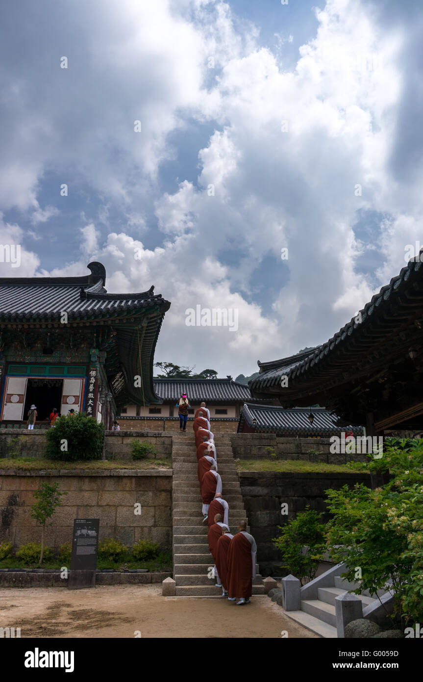 Monks walking to temple Stock Photo - Alamy