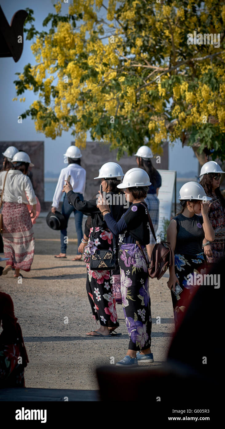 Japanese tourists wearing mandatory hard hats at the Sanctuary of Truth ...