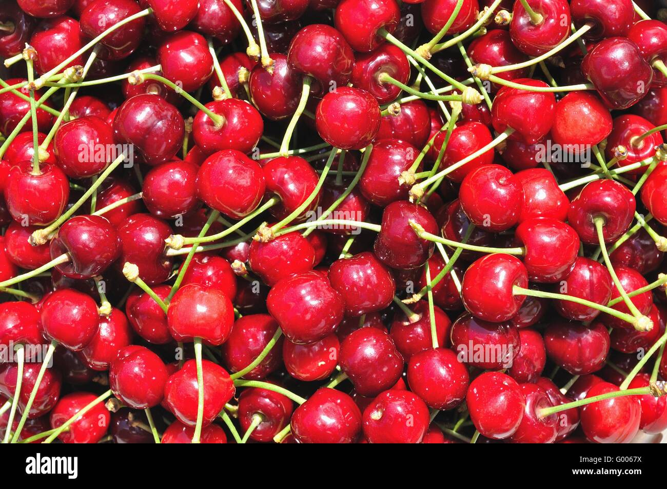 Texture from group of red ripe cherries. Natural background Stock Photo ...