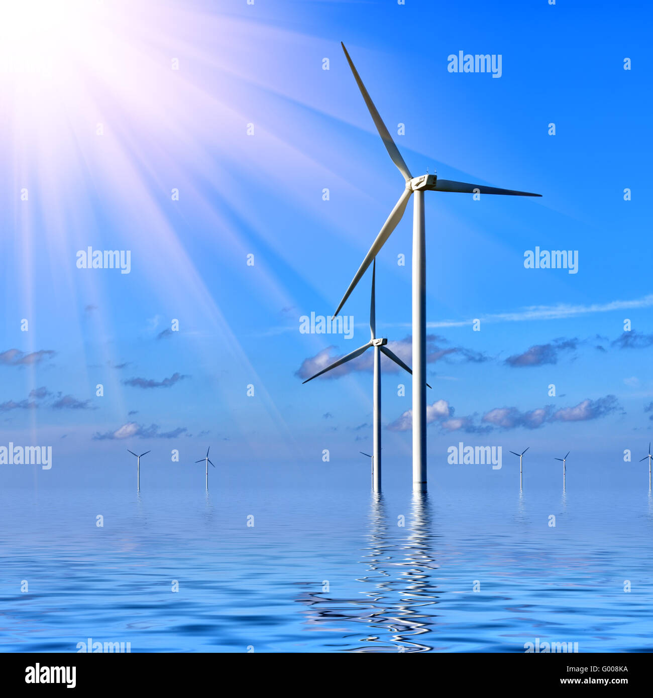 Offshore Wind farm against a blue sky at sunrise Stock Photo - Alamy