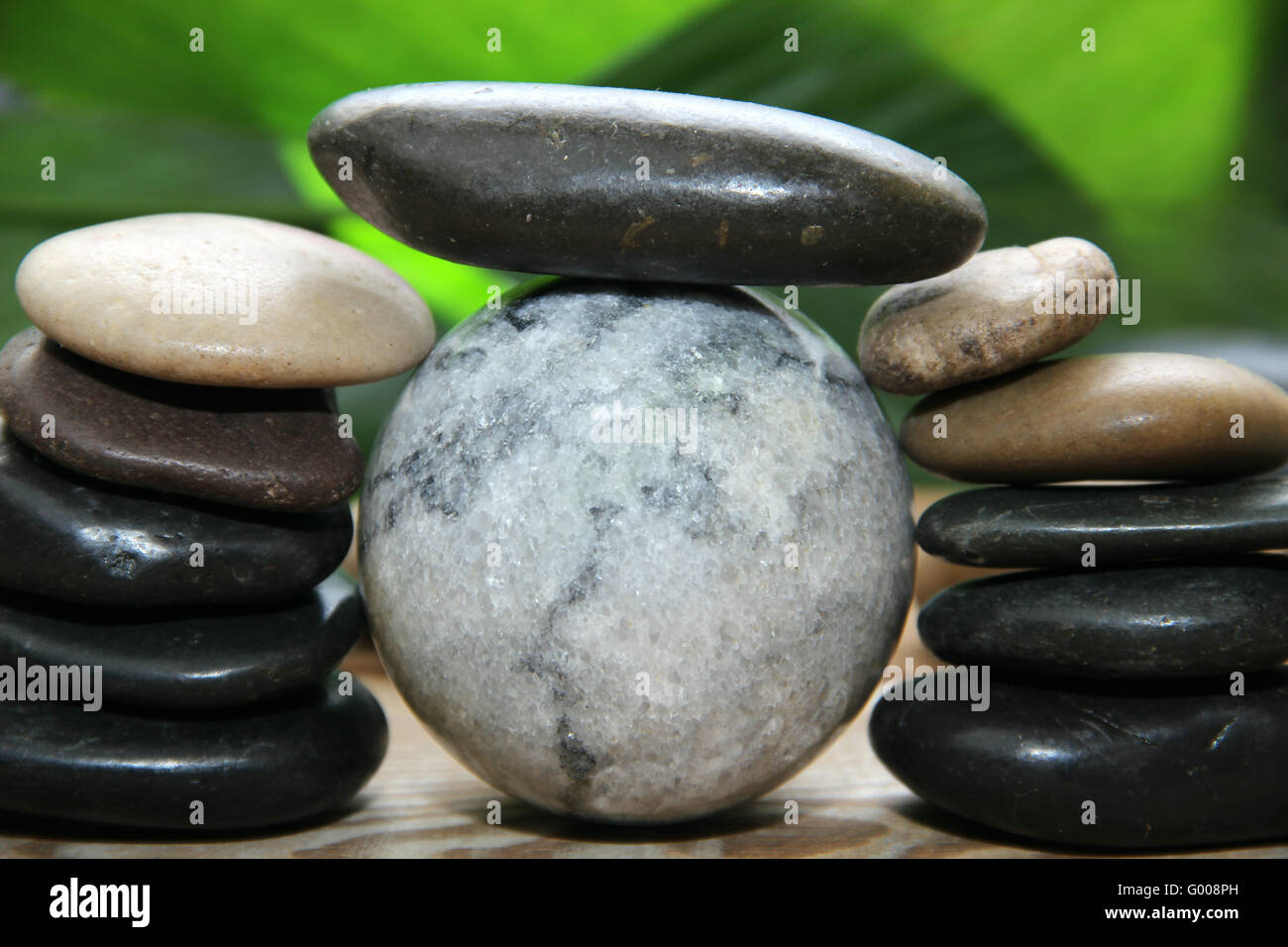 Ball and stones Stock Photo - Alamy